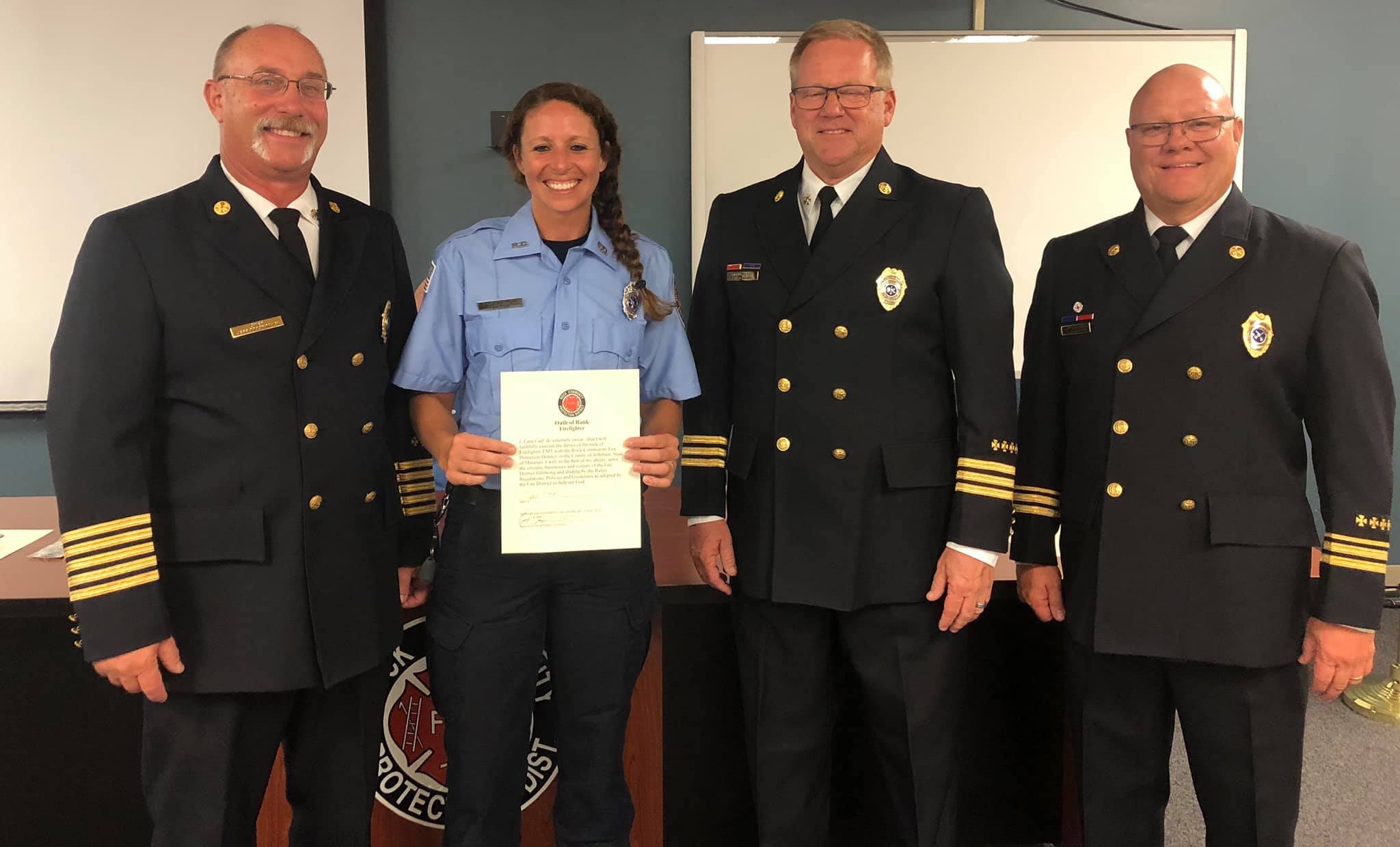 RCFPD badge pinning – Rock Community Fire Protection District